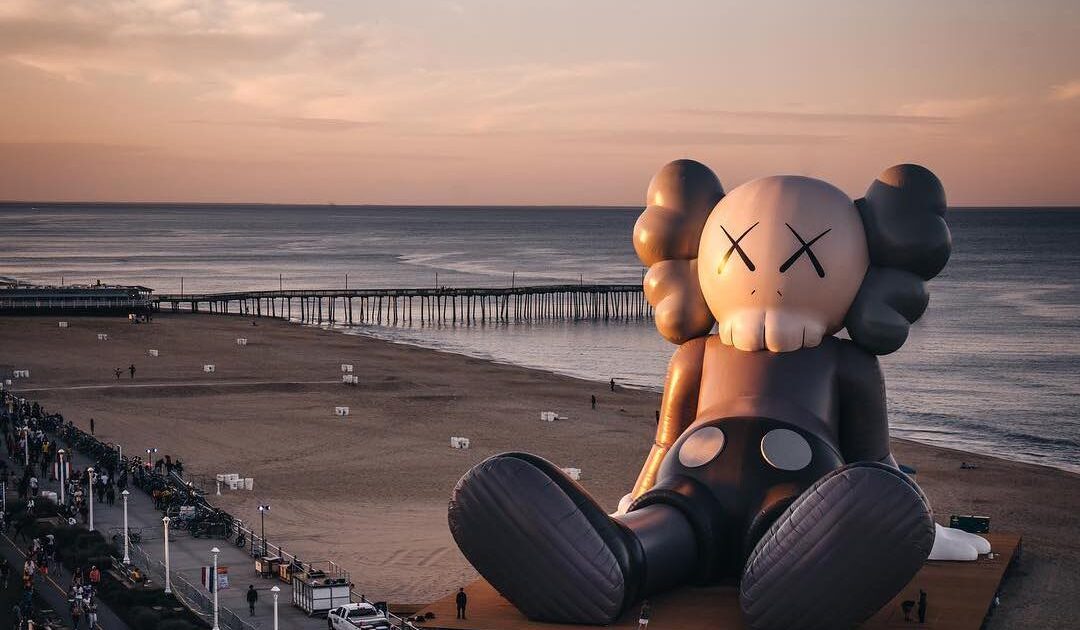 KAWS Brings His 'HOLIDAY' Inflatable to Pharrell's 'Something in the ...